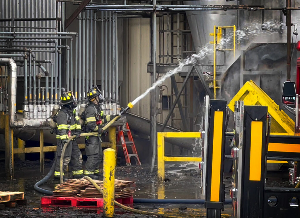 Beaver Lane Fire-Rescue Crew Hoses Down an Industrial Fire